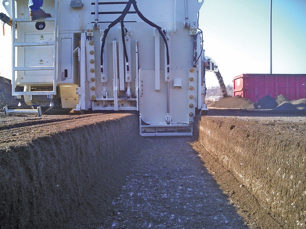 Improved cutter housing on RX-400 planer From: Roadtec Inc. - Astec ...