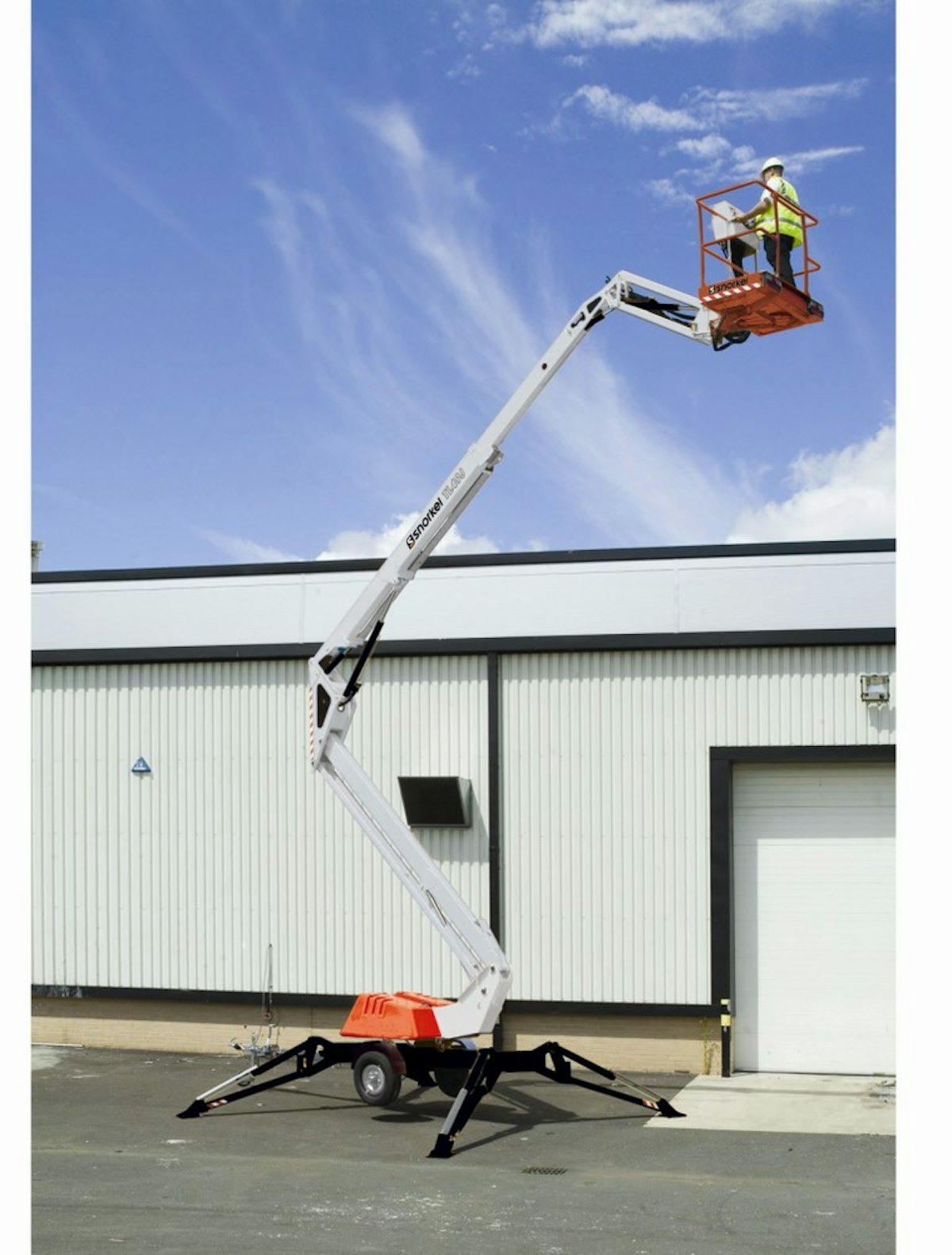 TL49J Towable Articulated Boom Lift From: Snorkel | For Construction Pros