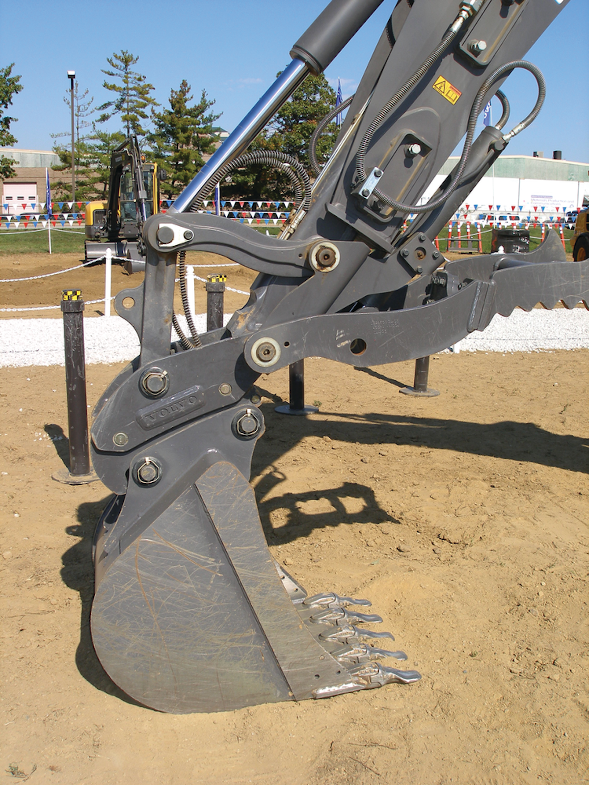 Boom Designs Extend Backhoe Performance | For Construction Pros