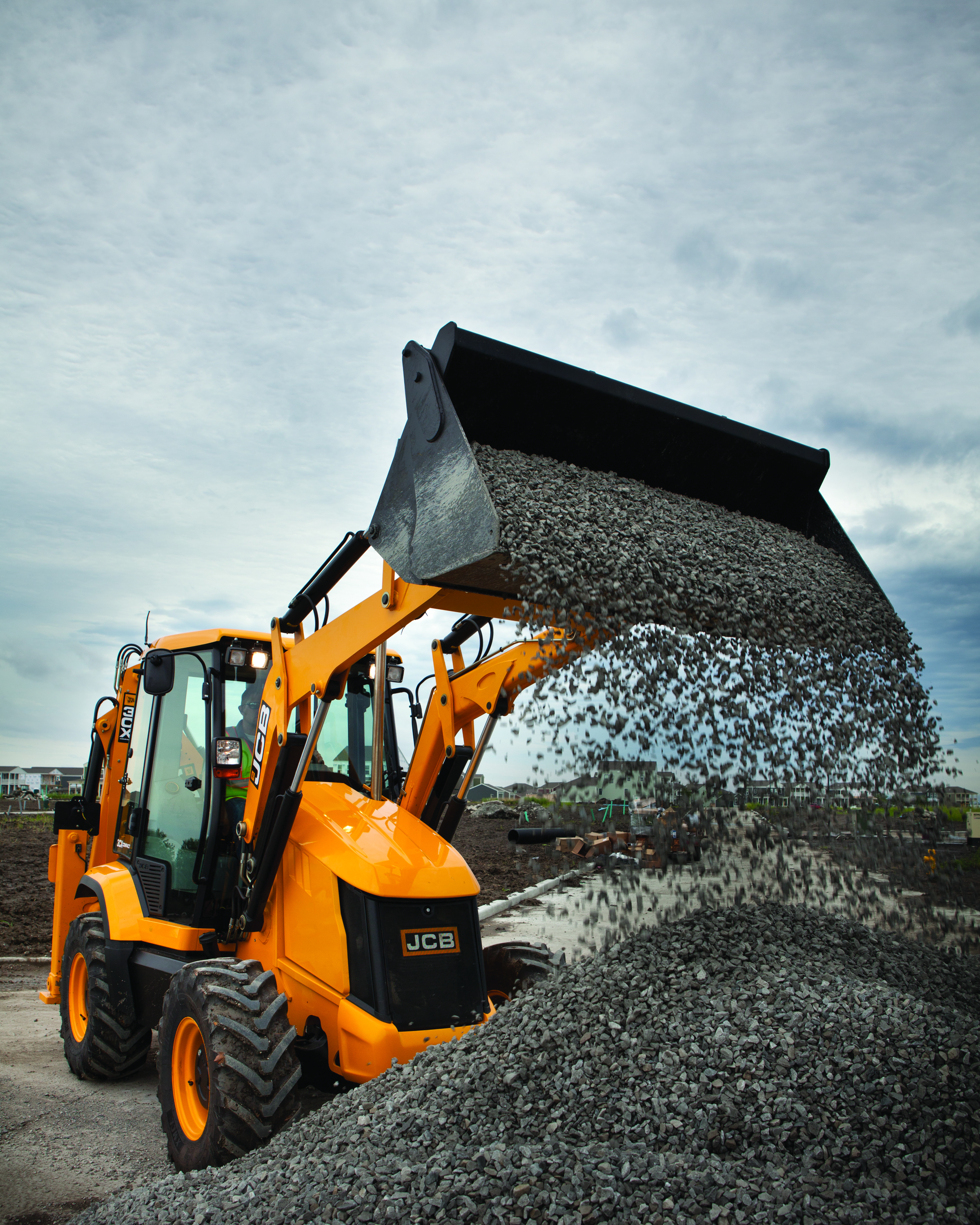 The Backhoe Loader: A Construction Site Jack-of-All-Trades | For ...