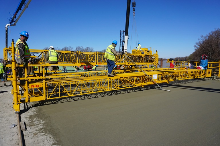 Bid-Well Featuring a Fully Equipped Roller Paver and Work Bridge at WOC ...