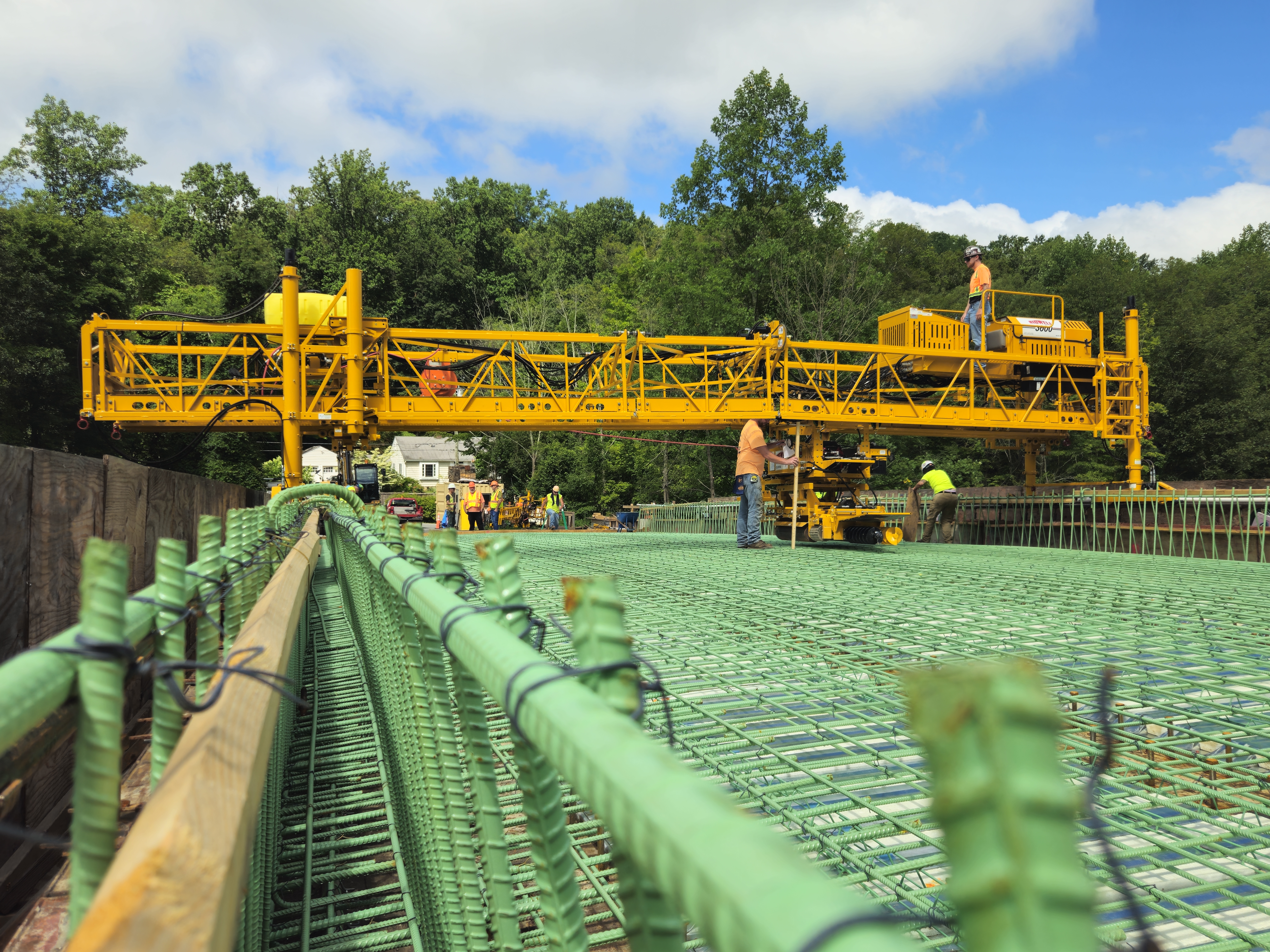 Bid-Well Featuring a Fully Equipped Roller Paver and Work Bridge at WOC ...